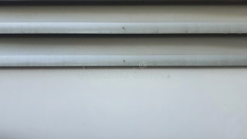 White Cement Wall with Silver Zinc Panels, Factory Wall. Stock Image ...