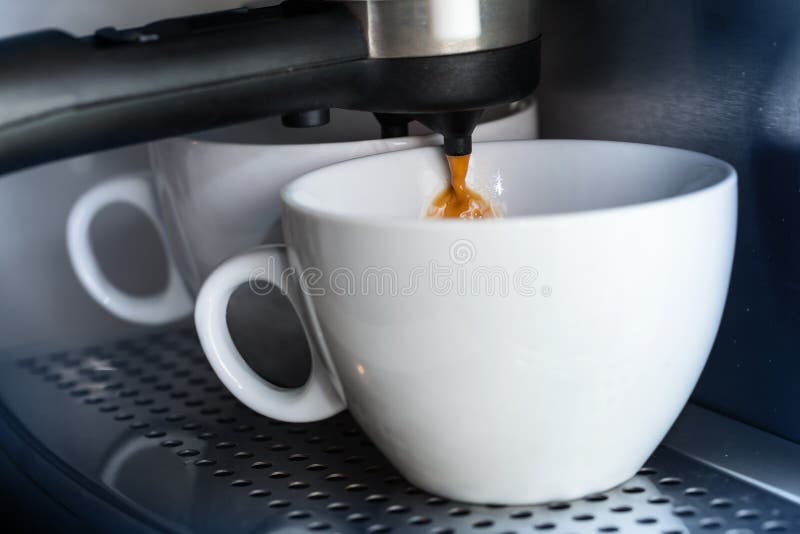 White Ceramic Cups in the Coffee Machine Stock Image - Image of ...