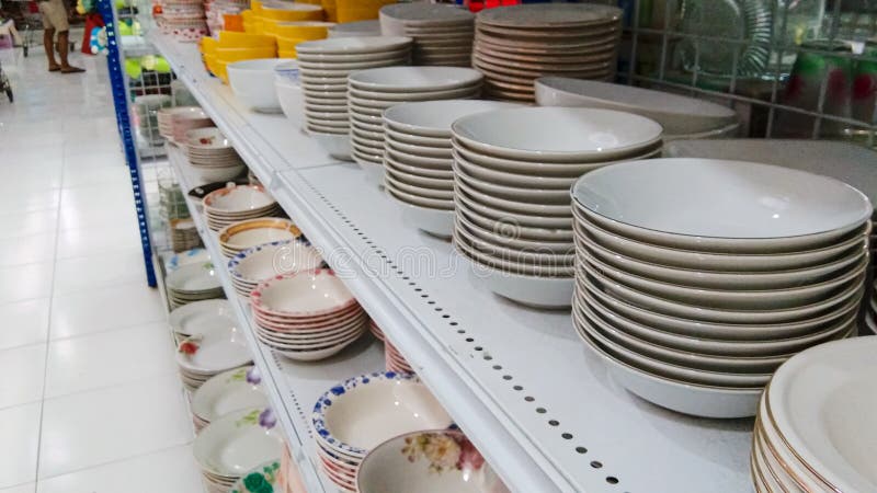 White Ceramic Plate Display in Convenience Store Editorial Photography ...