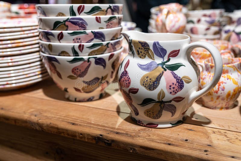 White Ceramic Plates on Shelf in a Store. Designer Ceramic Plates with ...
