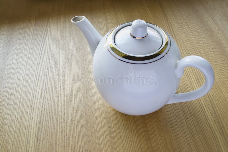 White ceramic teapot stock image. Image of beverage, blank - 34506949