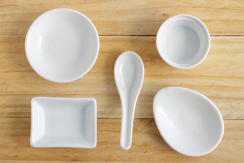 White Ceramic Ware on Wooden Table. Stock Photo - Image of natural ...