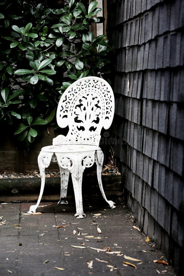 White Chair stock image. Image of leaves, chair, wall - 86303587