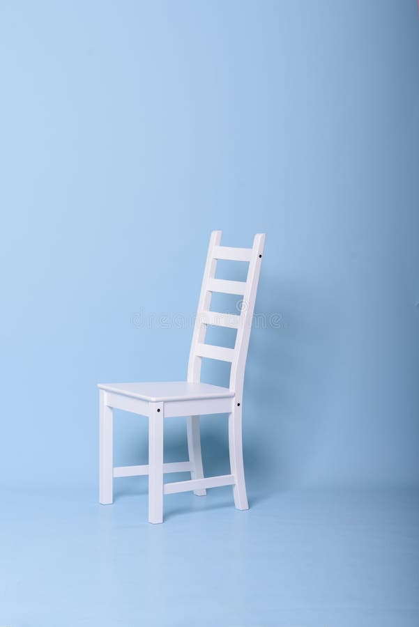 White Chair on a Blue Background Stock Image - Image of sign, city ...