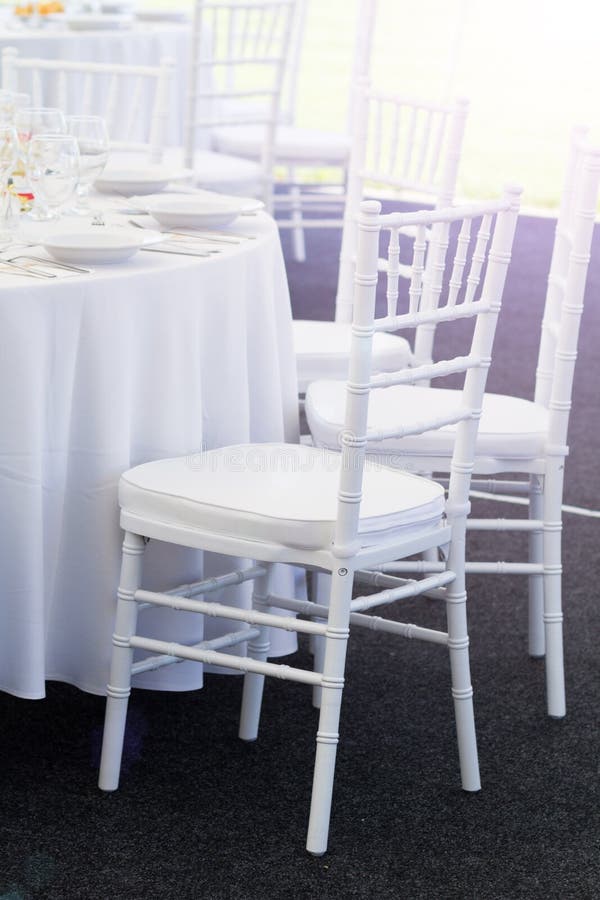White Chair and Fancy Table Set for a Wedding Dinner Stock Photo ...