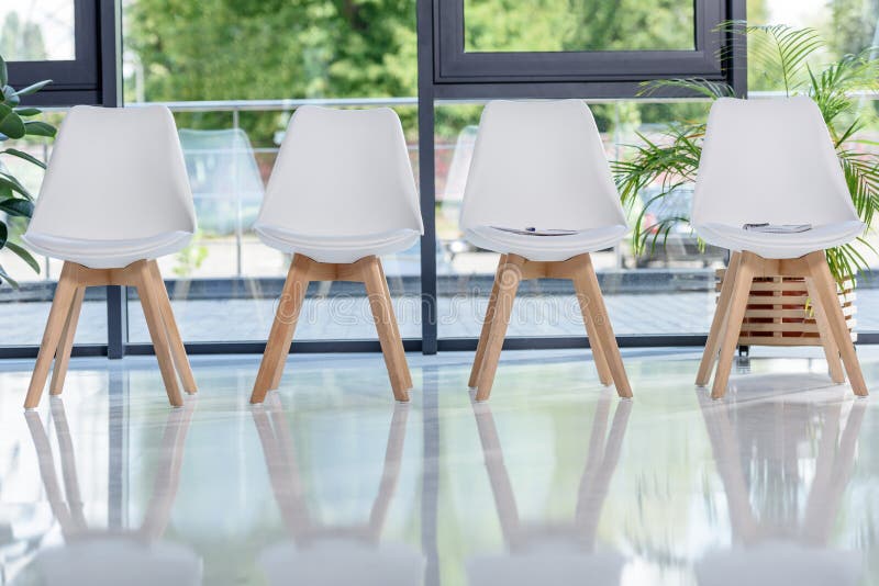 White Chairs in Light Modern Office Stock Photo - Image of empty, light ...