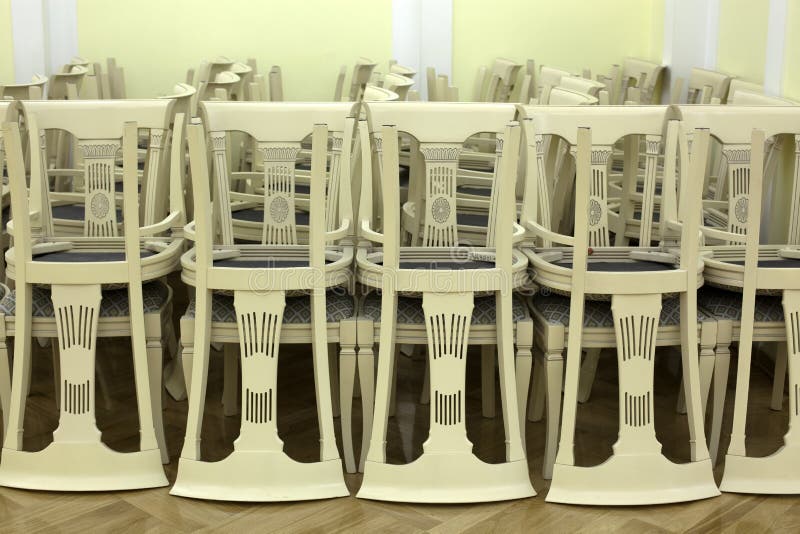 Stack of Assorted Wooden Chairs in Random Disarray, Full Frame ...