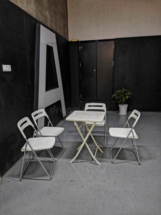 White Chairs and Table in Empty Room Stock Photo - Image of room, table ...