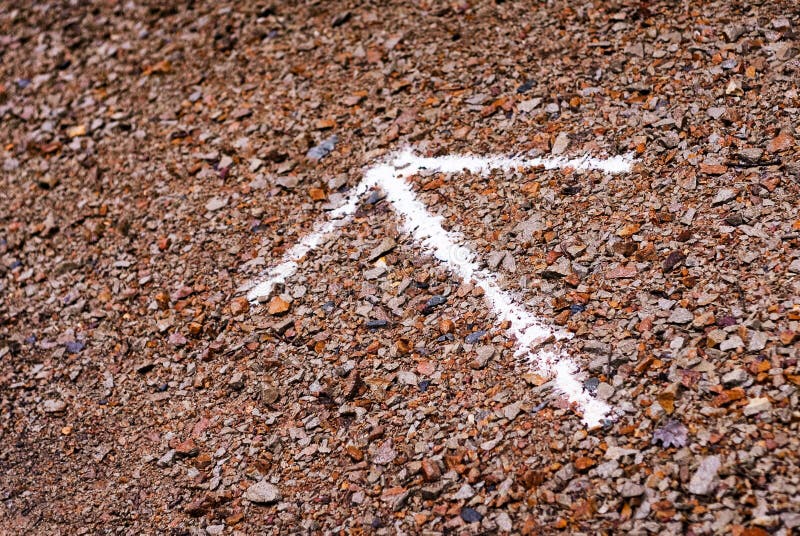 White Chalk Arrow Direction Mark on Natural Stones Stock Photo - Image ...