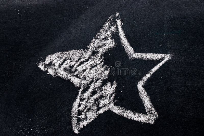 White Chalk Hand Drawing As Star Shape on Black Board Stock Photo ...