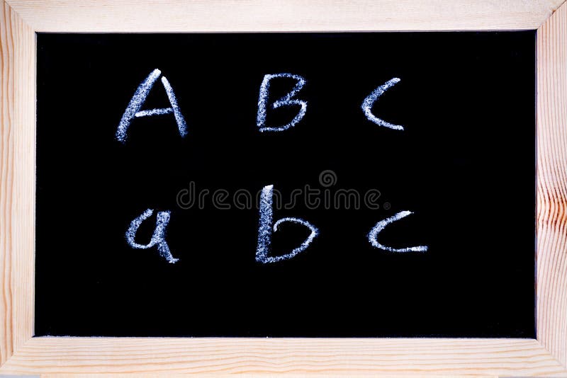 White Chalk Written on a Blackboard Stock Photo - Image of alphabet ...