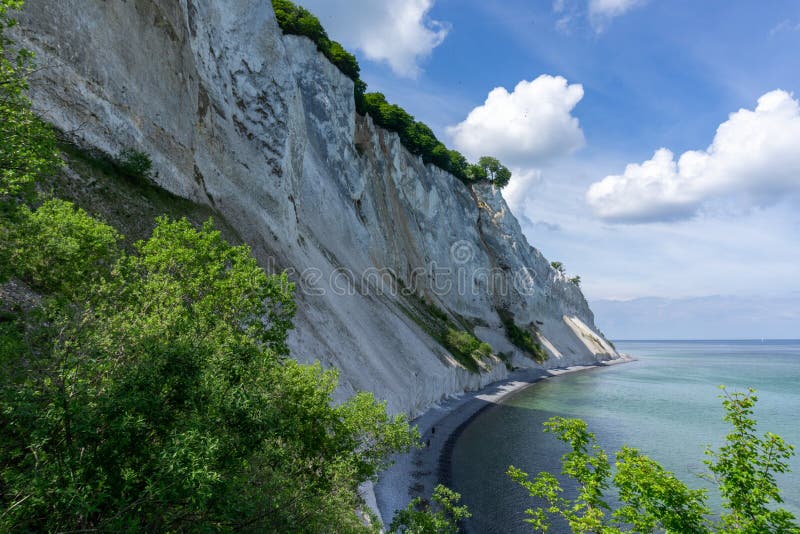 White Chalkstone Cliffs on the Ocean Coast with Lush Green Forest in ...