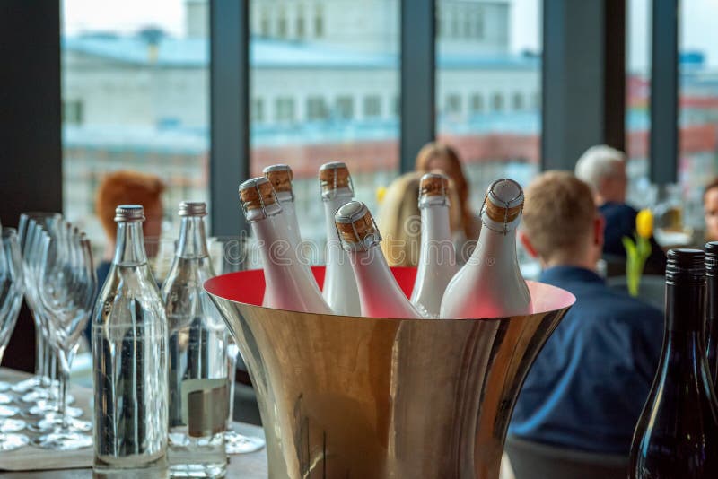 White Champagne Bottles in an Ice Cooler Stock Photo - Image of service ...