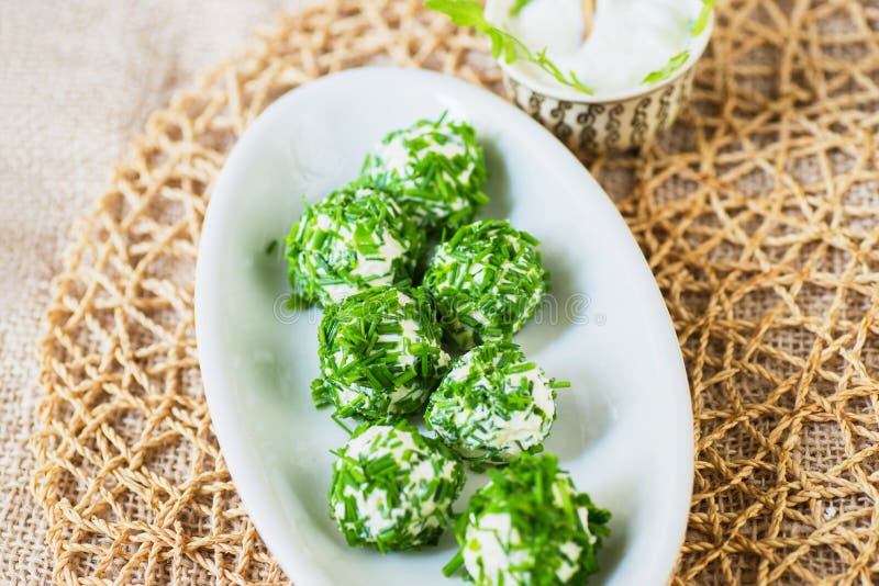 White Cheese Balls Covered with Chive Shoot. Stock Image - Image of ...