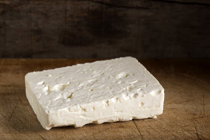 White goat cheese block stock photo. Image of expressing - 7923862