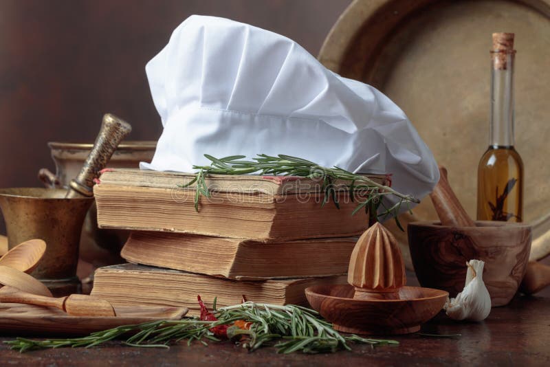 White Chef`s Hat and Old Cookbooks. Stock Image - Image of background ...
