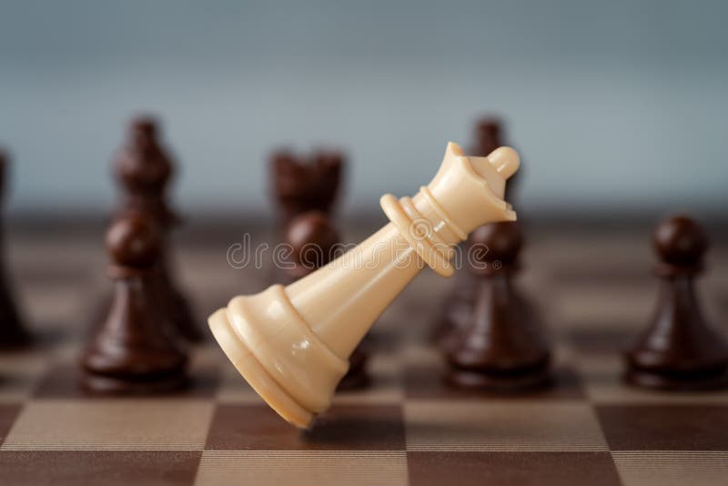 White Chess Castle Falling on Chess Board Concept of Failing Stock ...