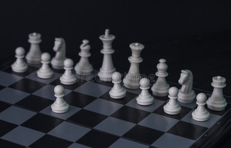 White Chess Figures on Board. White Chess Set in Order for Game Start ... White Chess Figures on Board. White Chess Set in Order for Game Start ...