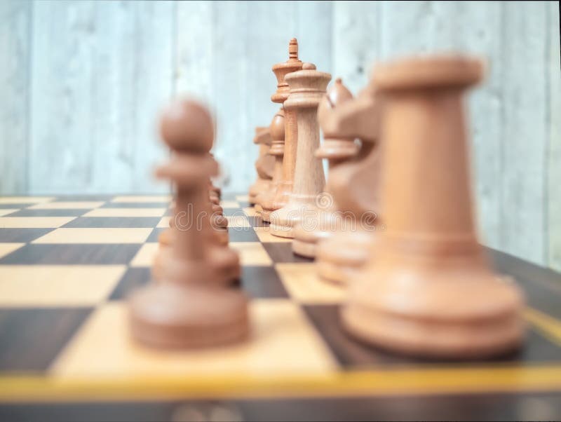 White Chess King Standing in a Rows of White Pieces on a Chessboard ...