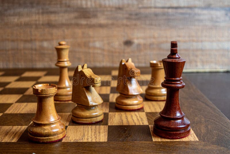 White Chess Pieces in Attack Position on the Board Stock Photo - Image ...