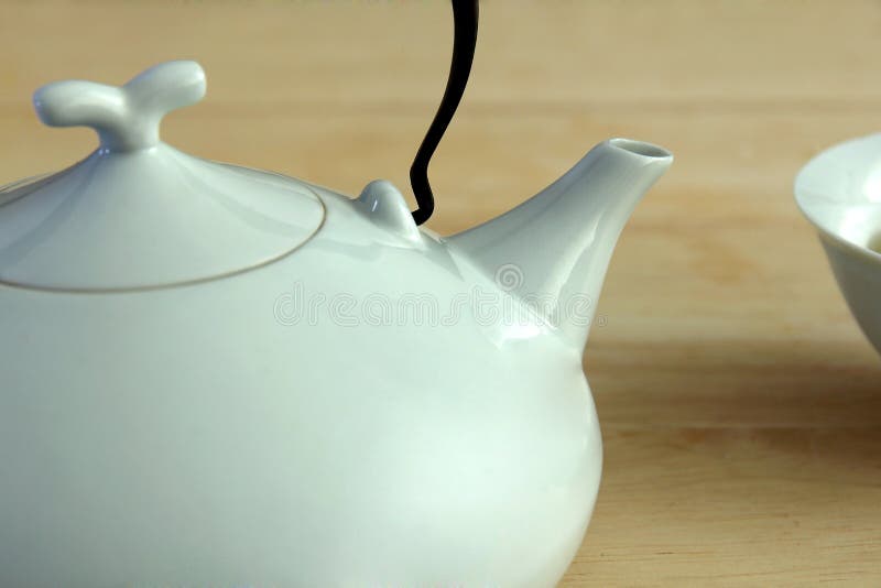 White china pot and cup stock image. Image of liquid - 21784913