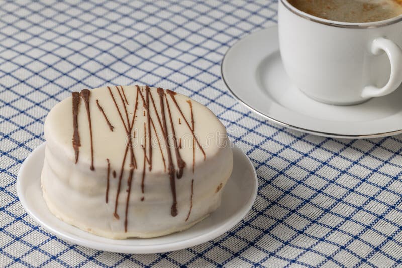 White Chocolate Alfajor, Typical Candy in Argentina, with a Cup of ...