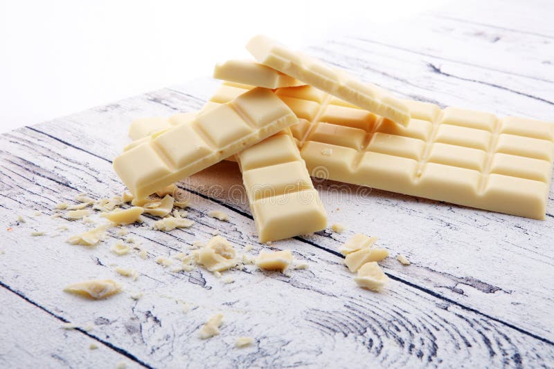 White Chocolate Bars and White Choco Pieces on Wood. Stock Photo ...