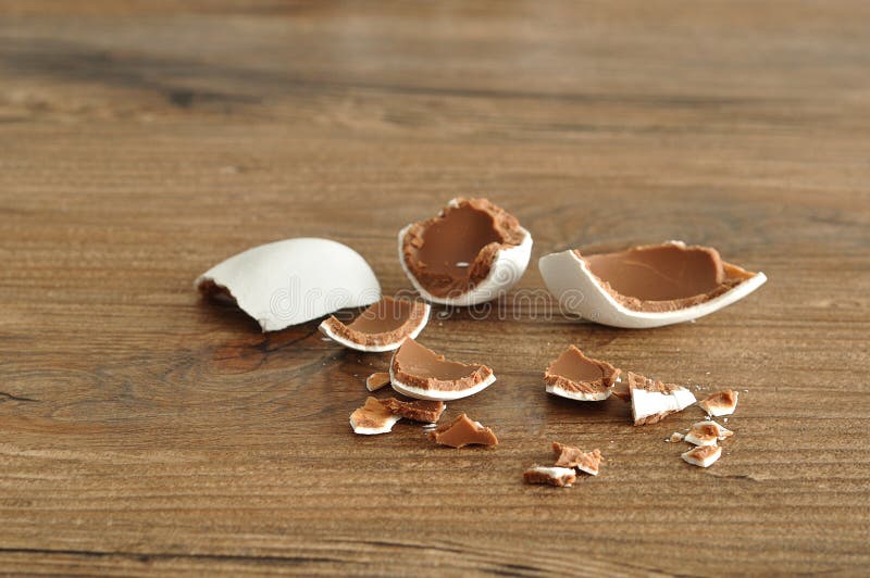 A White Chocolate Coated Easter Egg Broken into Pieces Stock Photo ...