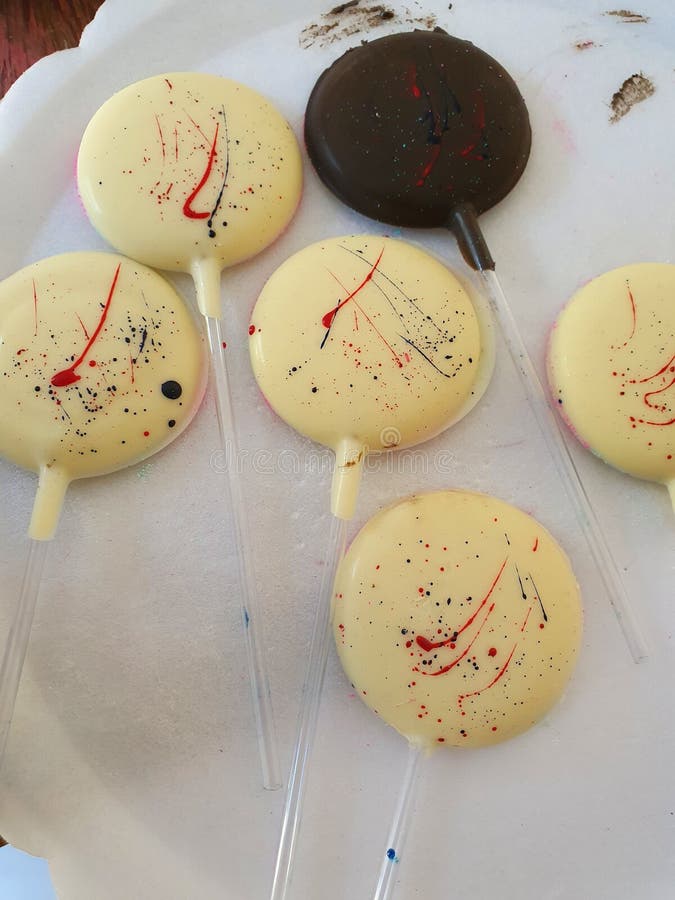 White chocolate lollipop stock image. Image of food - 204853041