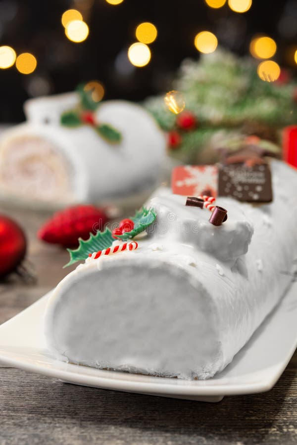 White Chocolate Yule Log Cake with Christmas Lights Stock Image - Image ...