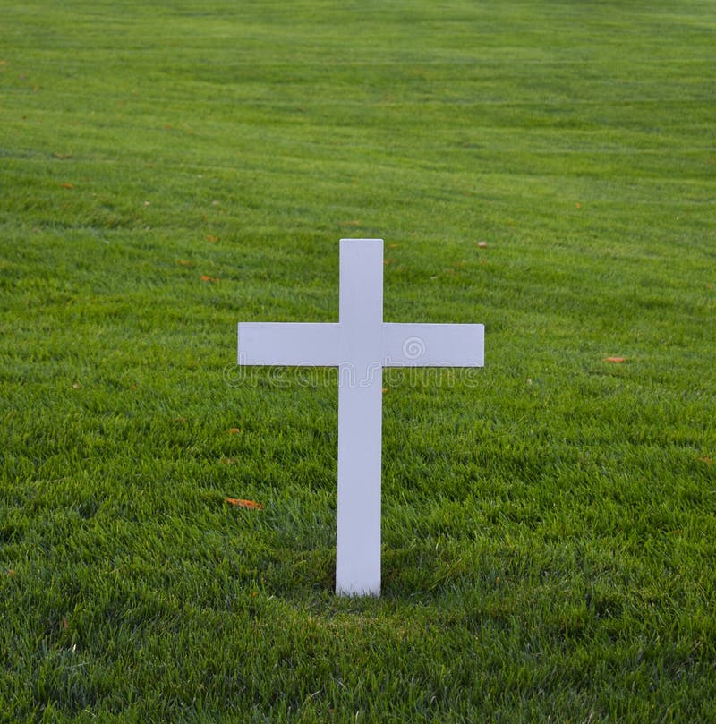 White Christian Cross Surrounded by Green Grass Stock Photo - Image of ...