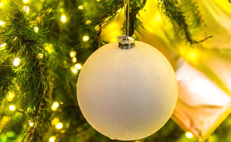 White Christmas Ball on a Christmas Tree Editorial Stock Photo - Image ...