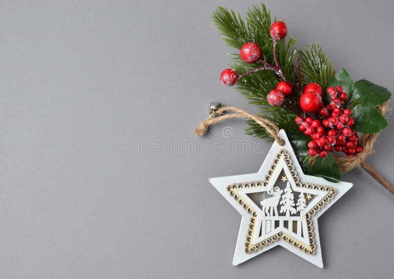 White Christmas Star and Spruce Branch on a Gray Background Stock Image ...