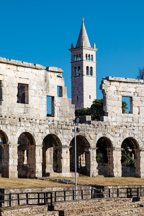 White Church and the Roman Amphitheater in Pula Stock Image - Image of ...