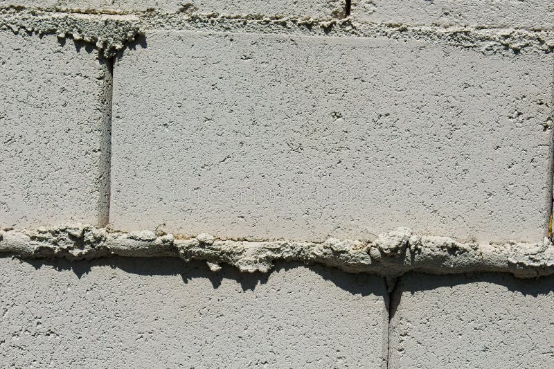 White Cinder Block Wall with Oozing Concrete. Stock Image - Image of ...