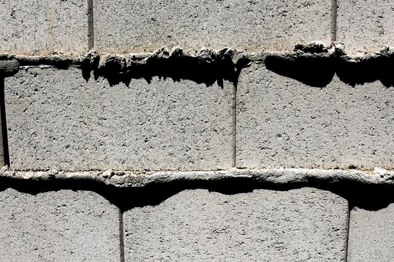White Cinder Block Wall Oozing Concrete Stock Photos - Free & Royalty ...