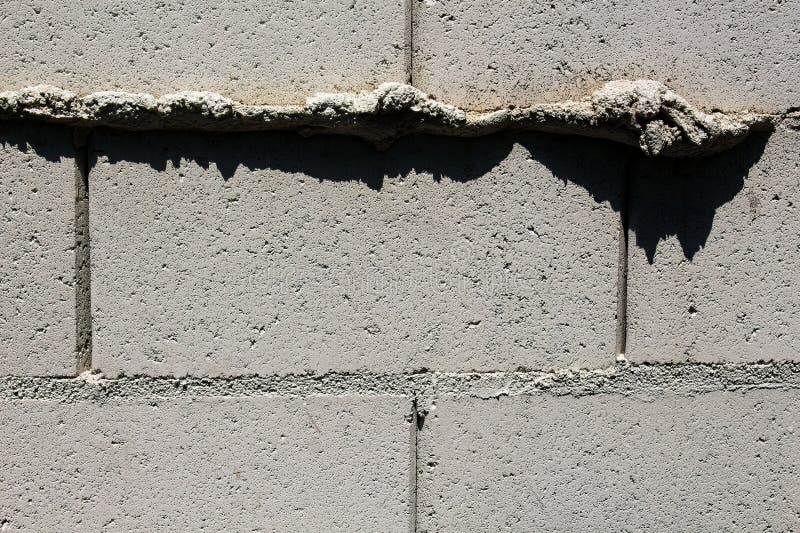 White Cinder Block Wall Oozing Concrete Stock Photos - Free & Royalty ...