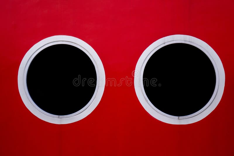 White Circle Window Black Glass on Red Wall Stock Photo - Image of ...