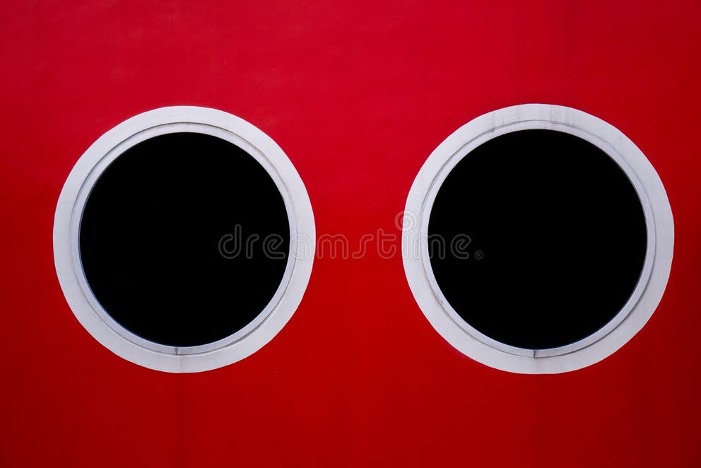 White Circle Window Black Glass on Red Wall Stock Photo - Image of ...
