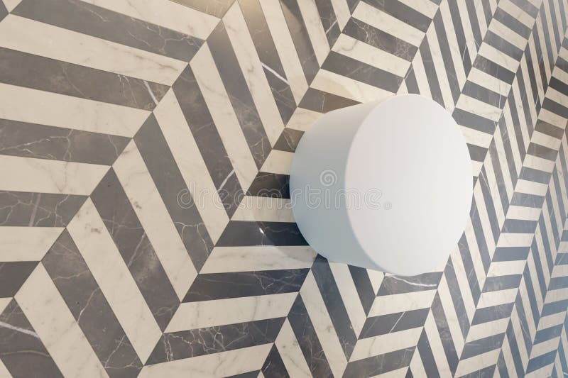 White Circular Chair on a Checkered Wall Design Stock Image - Image of ...