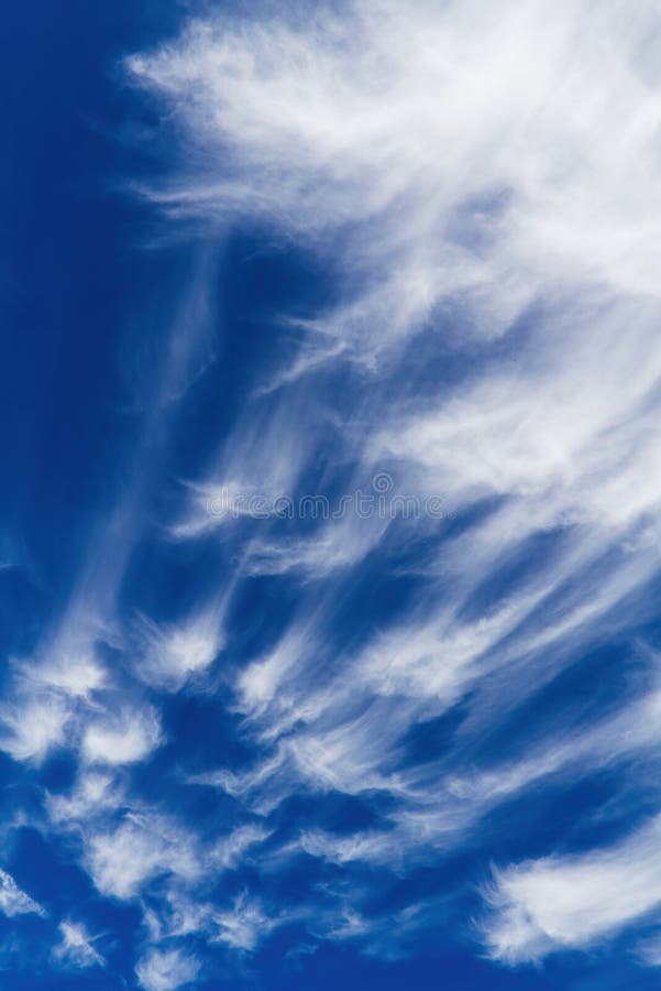 White Cirrus Clouds in a Blue Sky Smeared by Winds Stock Image - Image ...