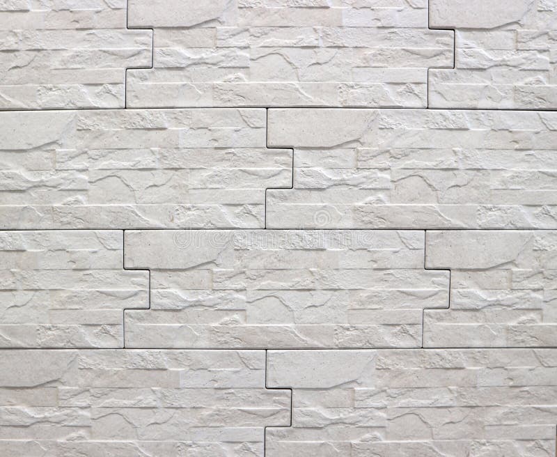 White Cladding Wall Made of Stoneware with Interlocking Tiles ...