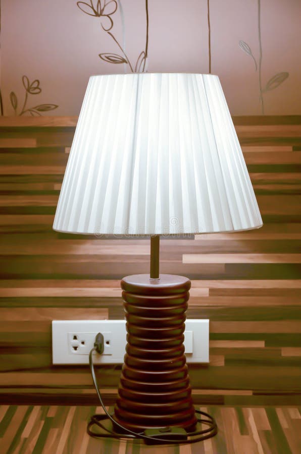 Classic Lamp on Stool Near Bed Stock Image - Image of brown, decor ...