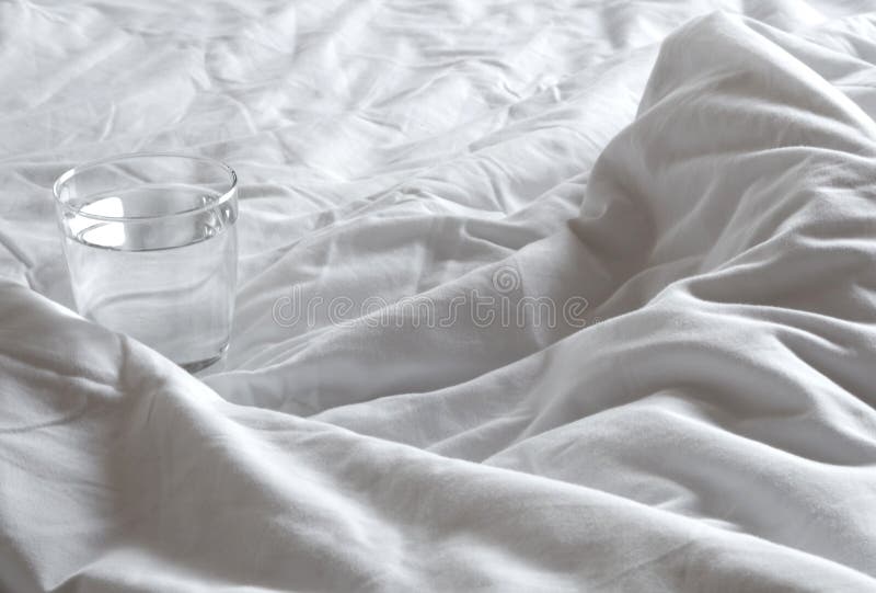 White and Clean Blanket Crumpled on Bed Stock Photo - Image of blanket ...