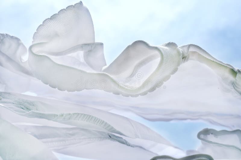 White Clean Linen To Dry Outside on a Sunny Day, Bottom View Stock ...