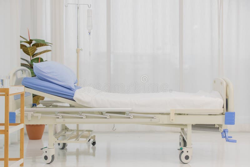 White and Clean Tone Patient Bed in Hospital Room Stock Image - Image ...