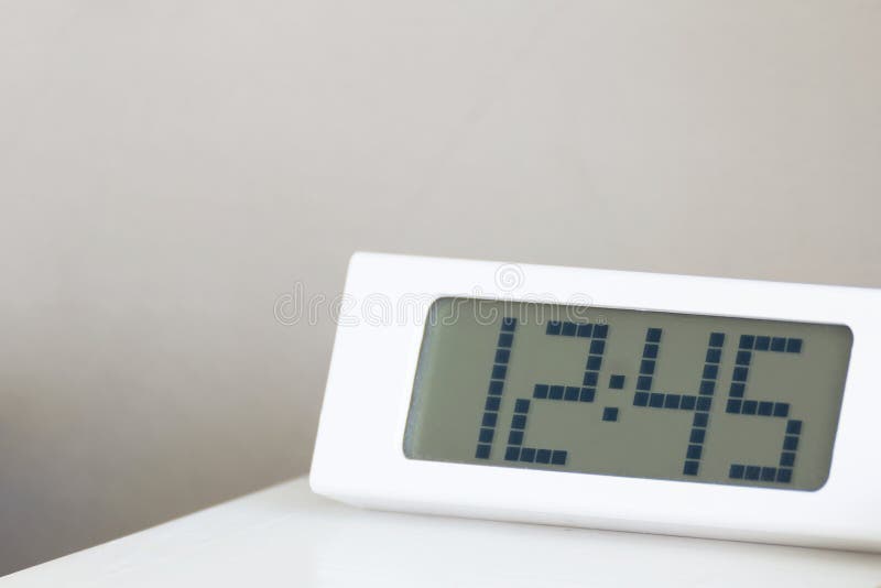 White Clock Digital on White Table Stock Photo - Image of clock, hour ...