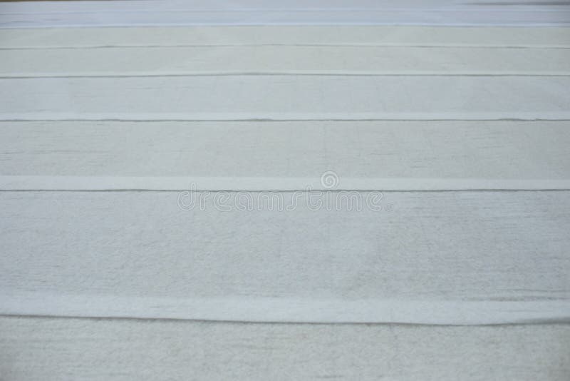 White Cloth Lies in Layers. Covered Surface Stock Photo - Image of ...