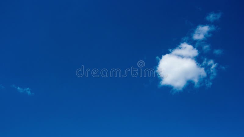 White Cloud Moves Quickly and Changes Shape Against the Blue Sky. Cloud ...