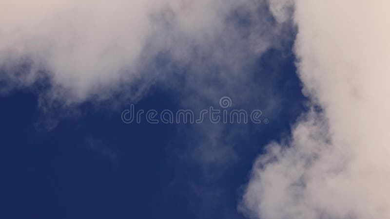 White Cloud Moves Quickly and Changes Shape Against the Blue Sky. Cloud ...